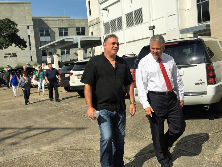 St. Bernard Sheriff James Pohlmann, right, walks with Deputy Chief John ...